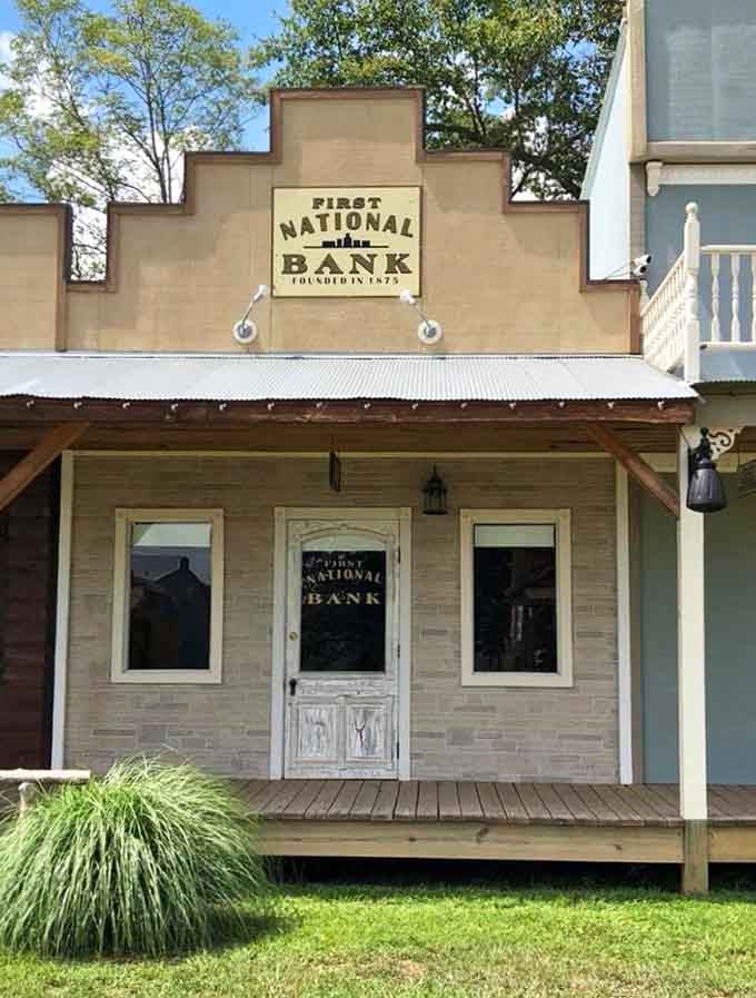 First National Bank promises secure frontier finances, its distinctive facade featuring that classic Western stepped roofline design.