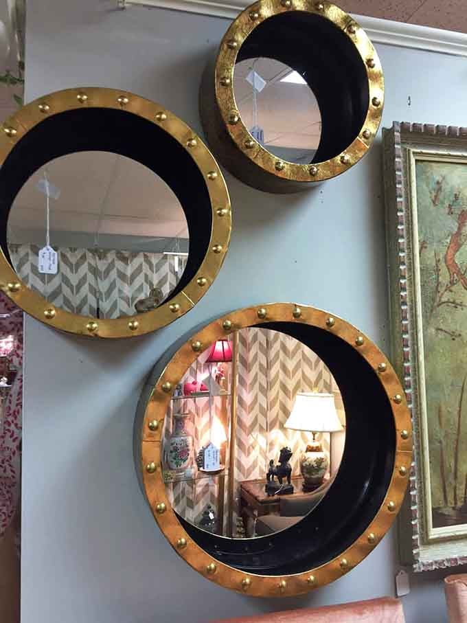 Porthole mirrors with brass accents, because your reflection deserves to feel nautical and slightly more important.