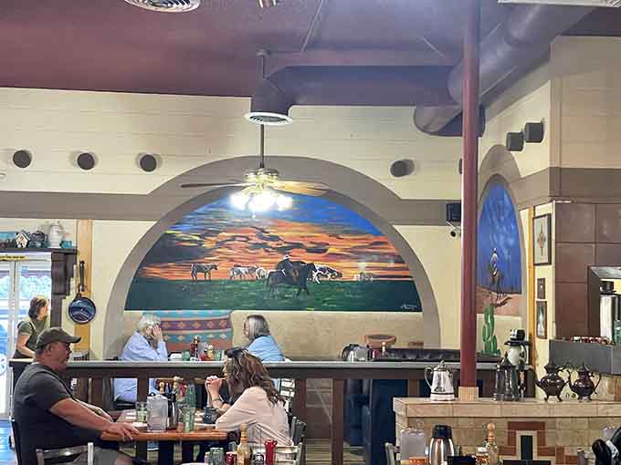 Diners gather beneath a stunning mural, contemplating life's big questions like which of 101 omelets to order.