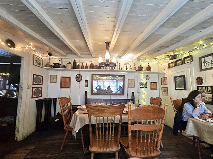 Another cozy corner showcasing the tavern's collection of vintage treasures, where every wall tells stories older than your grandparents' wedding photos.