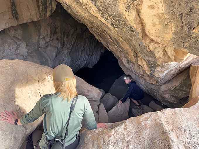 Smooth walls curve and fold like fabric frozen mid-dance in this underground ballroom space.