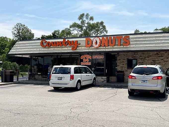The parking lot fills with cars as Crystal Lake residents make their daily pilgrimage to this temple of sweetness.