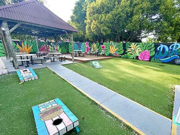 Artificial turf and shuffleboard create a backyard vibe that's more fun than your actual backyard, no lawn mowing required.