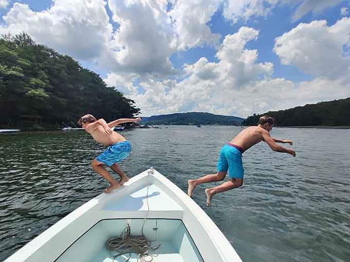 Two kids launching into summer like they're auditioning for a Mountain Dew commercial, pure joy edition.
