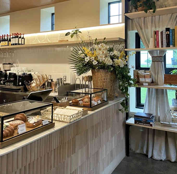 The counter displays pastries like jewels, tempting you to add just one more item to your order.