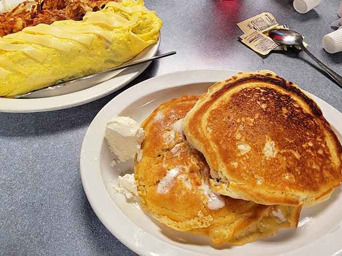 Pancakes so fluffy they practically float off the plate, ready to soak up that syrup perfectly.