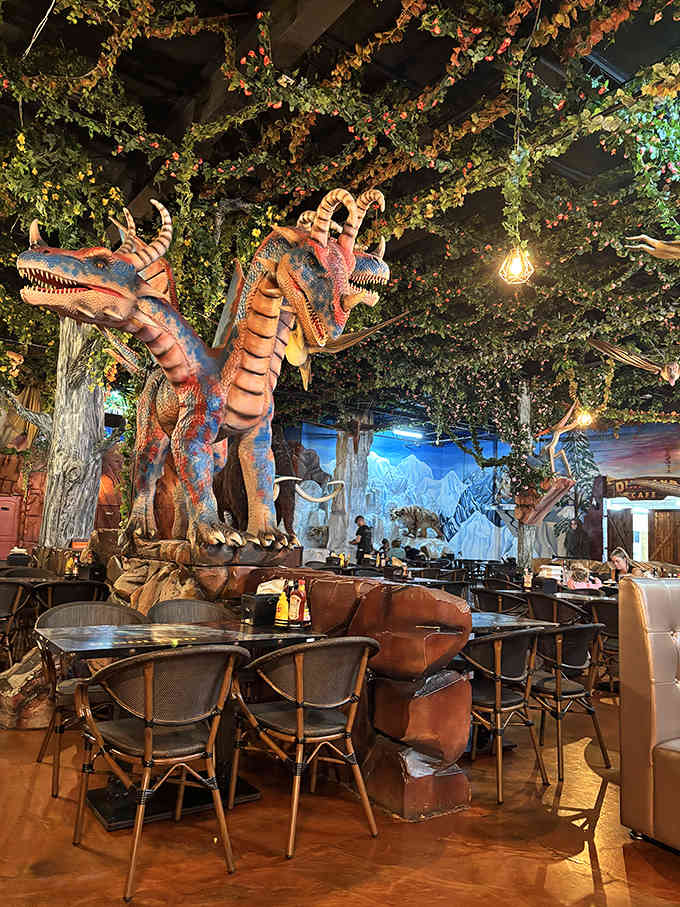A fearsome dragon creature presides over the seating area, adding just enough drama without scaring away the hungry customers below.