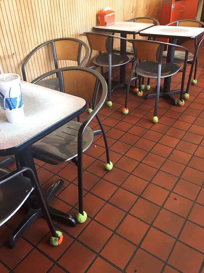Those tennis balls on chair legs are pure genius, protecting floors while adding unexpected whimsy to breakfast.