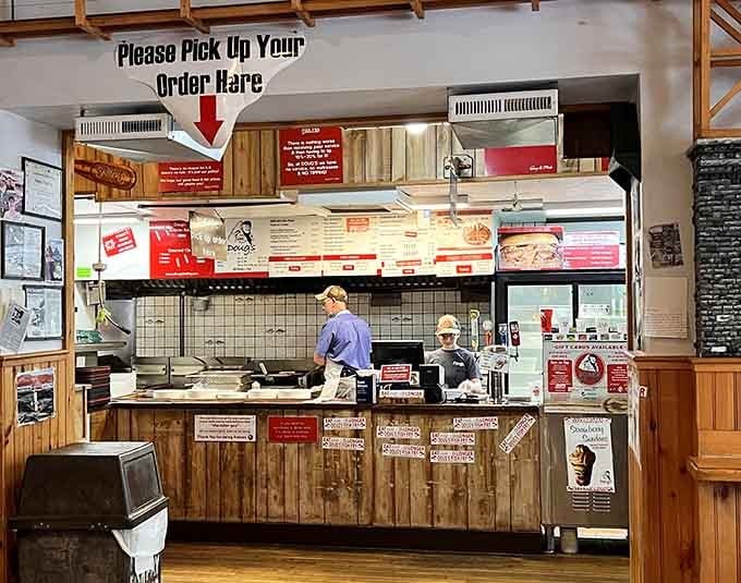 The order counter beckons like a beacon of fried hope, promising to solve all your hunger-related life problems.