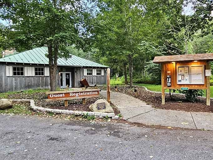 The registration building stands ready to welcome guests seeking refuge from the chaos of modern life.