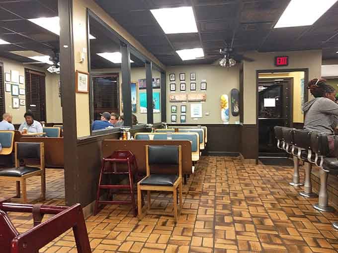 The dining room from another angle, showing off those booths and the kind of space that welcomes everyone from families to solo adventurers.