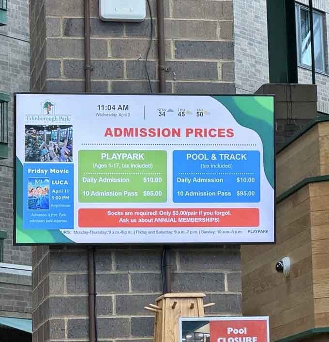 Admission prices clearly displayed, because transparency matters when you're about to unleash your kids into paradise for hours.