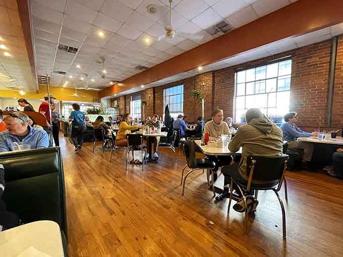 Hardwood floors and comfortable seating arrangements make lingering over that second cup of coffee feel absolutely mandatory, not optional.