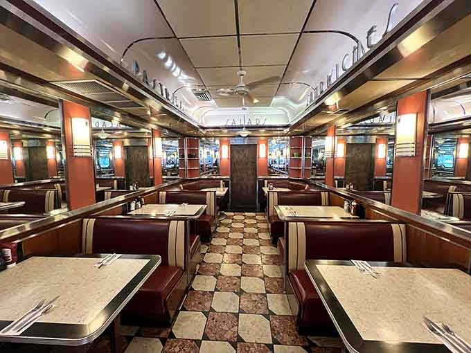 Rows of booths stretch into the distance like a delicious highway leading straight to comfort food paradise and happy memories.