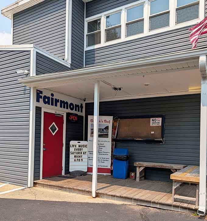 That red door entrance with the "Live Music Every Saturday Night" sign promises good times are waiting inside.