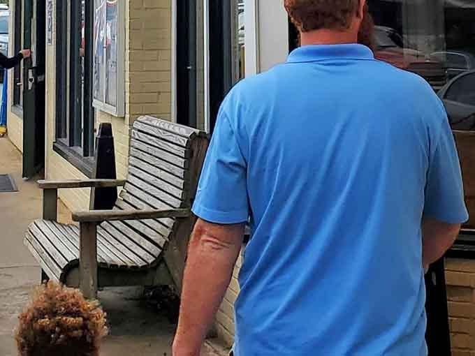 Even the family dog knows where the good food is, patiently waiting outside like Lassie on lunch break.