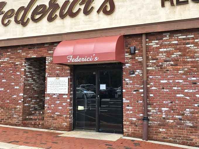 The entrance welcomes you with classic brick and that signature awning, like an old friend who's always happy to see you again.