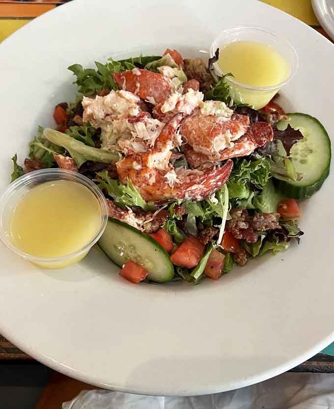 Fresh lobster crowning a salad proves that sometimes luxury comes in the form of greens done gloriously.