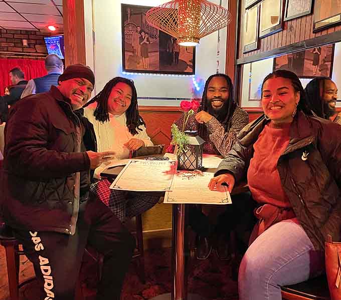 Happy faces around the table prove that great food brings people together better than any social media algorithm ever could.