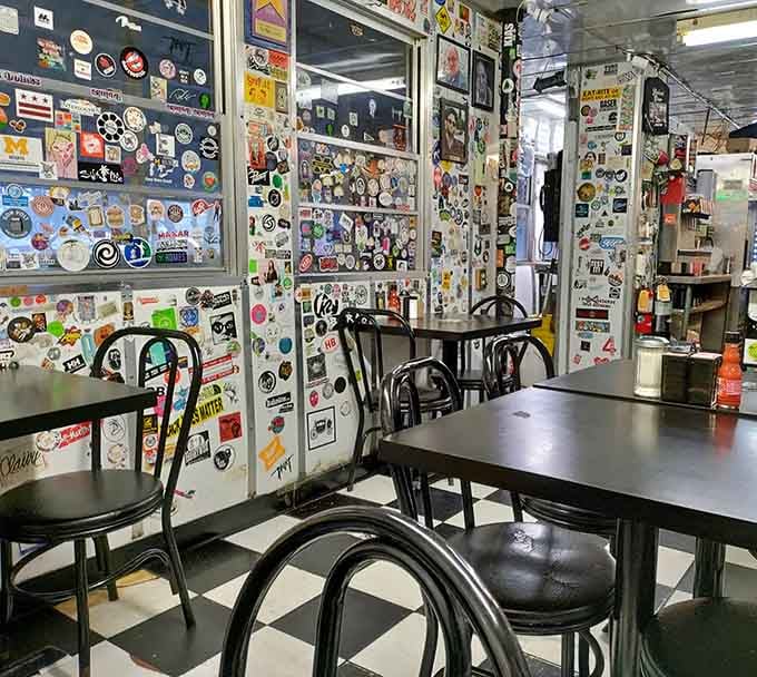 Stickers cover every available surface, creating a visual feast before your actual feast even arrives at the table.