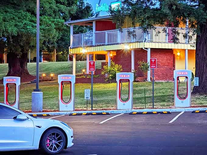Tesla Superchargers prove this retro gem embraces the future while celebrating the past with equal enthusiasm and style.