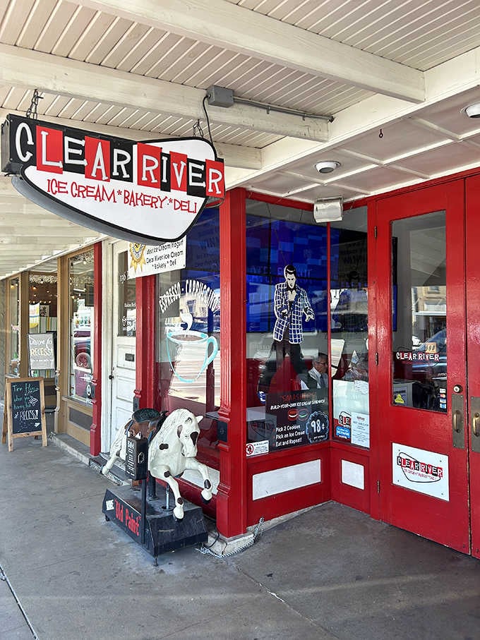 That vintage sign and cheerful cow statue guarantee this isn't your average ice cream shop experience.