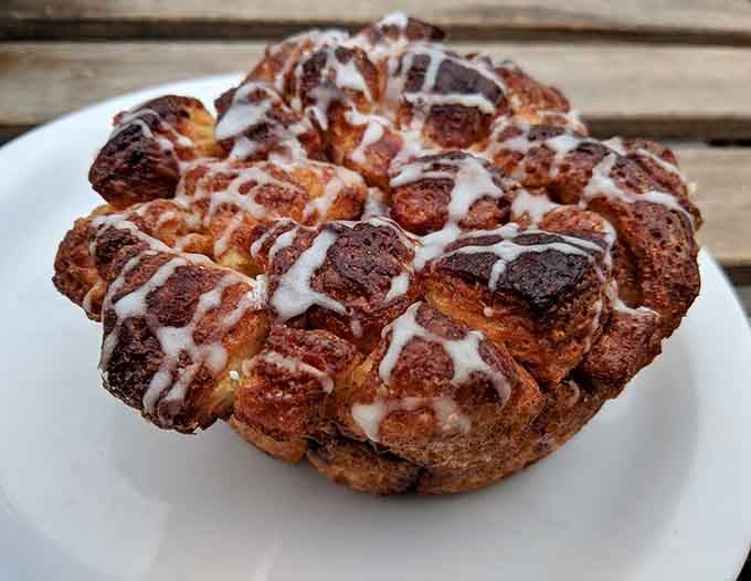 Monkey bread with sweet glaze drizzled on top transforms a classic into something worth planning your morning around.