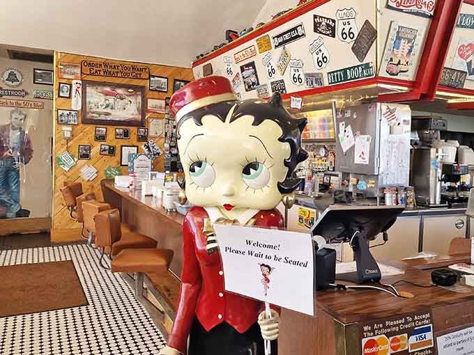 Betty Boop welcomes you to wait for your table&mdash;she's been greeting hungry travelers with style for years.