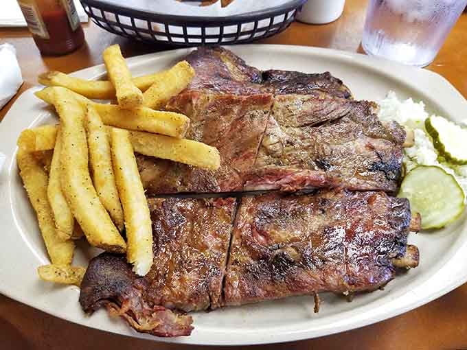 Ribs with char marks that tell stories of smoke and time, the two ingredients you absolutely cannot rush.