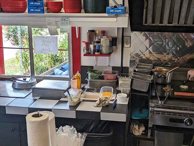 The kitchen where magic happens, one grilled frank and smashed burger patty at a time.