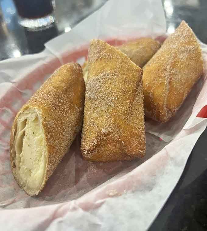 Cheesecake rolls dusted with cinnamon sugar are the kind of dessert that makes you forget every diet you've ever attempted.