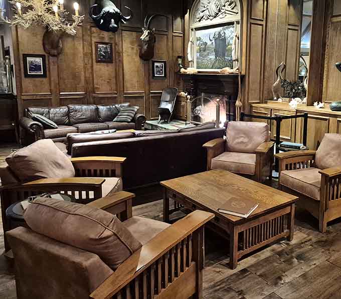 The lounge area features comfortable seating and hunting lodge vibes, perfect for pre-dinner drinks or post-meal relaxation.