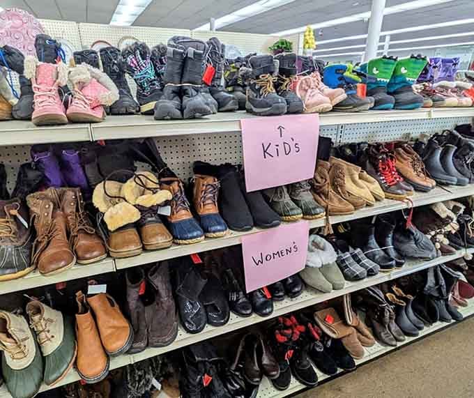 Footwear organized by size and age, from tiny boots to work shoes, all waiting for their next adventure.