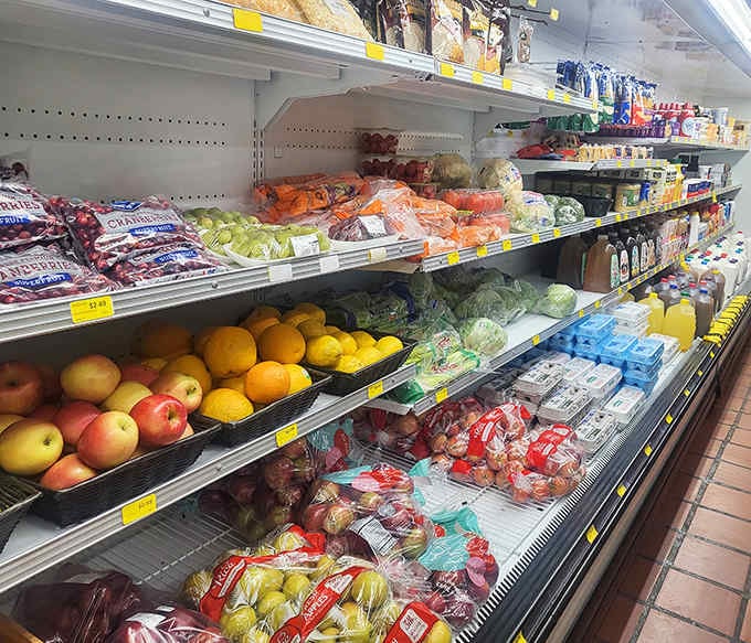 Fresh produce sits alongside everyday groceries, making this a legitimate one-stop shop for the whole neighborhood.