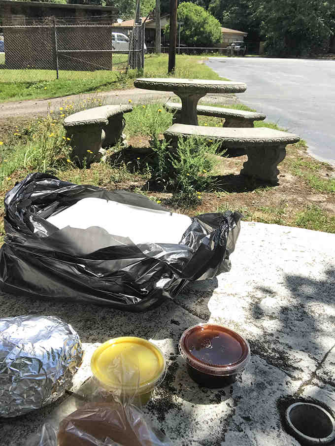 Outdoor seating that's seen countless family gatherings, first dates, and solo barbecue pilgrimages over the decades.