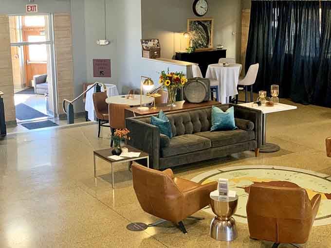 A lounge area that feels like the coolest living room you've ever been invited into, complete with piano.