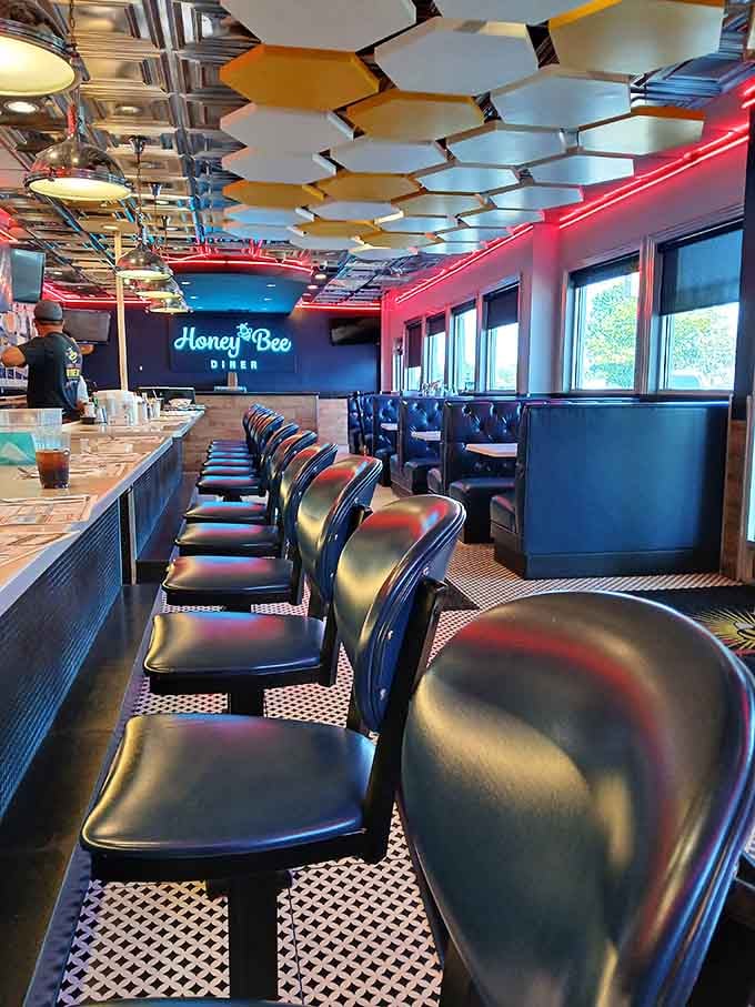 Those classic diner stools line up like soldiers ready to support your breakfast mission with style.