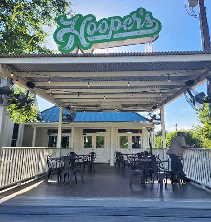 The covered patio offers al fresco dining under string lights, perfect for those gorgeous Hill Country evenings by the lake.