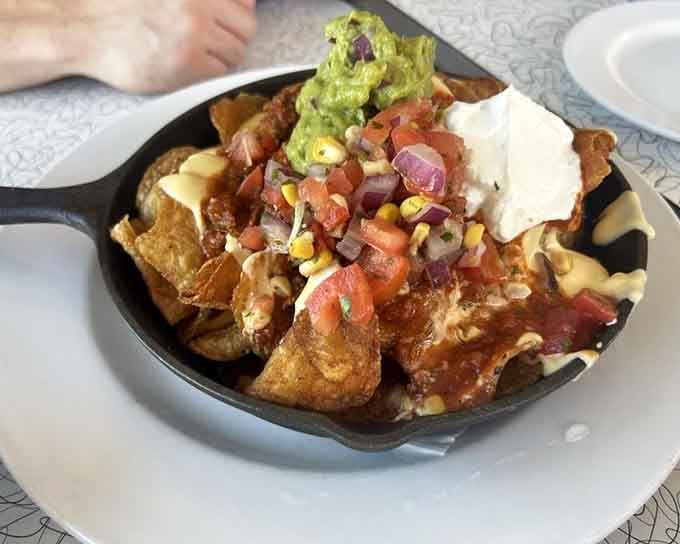 Nachos served in a skillet because regular plates are for people without proper priorities in life.
