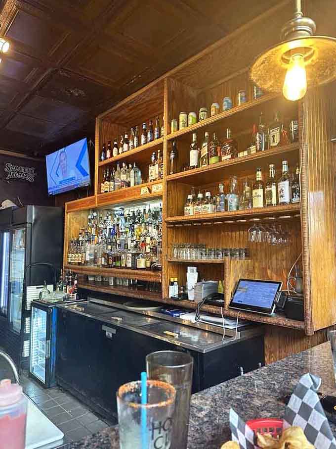 A well-stocked bar ready to pour cold beers and cocktails that pair perfectly with fresh seafood.