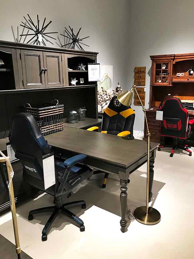 Gaming chairs meet traditional desk in this office setup that bridges generations of work styles perfectly.