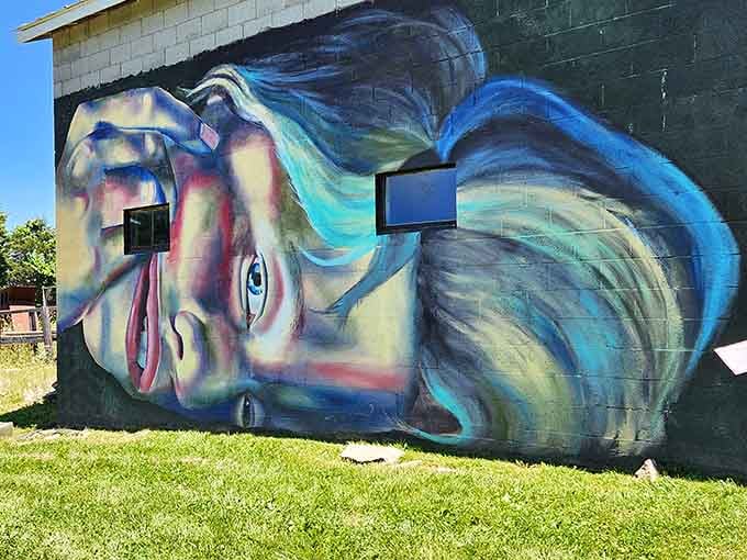 This vibrant mural transforms a simple building wall into a canvas that would make Andy Warhol nod approvingly.