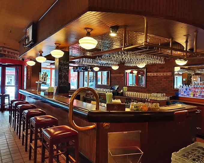 A polished bar area that gleams with possibility, perfect for a nightcap or pre-dinner cocktail with old friends.
