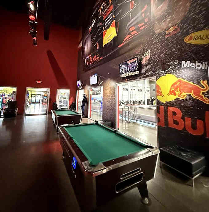 Lounge space featuring pool tables, because apparently some people need to decompress before admitting they came in last.