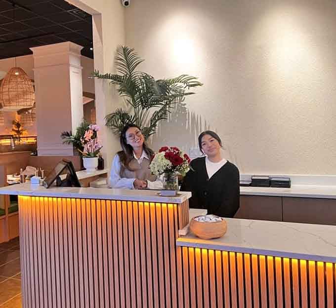 The host station welcomes you with warm smiles and the promise of unlimited culinary adventures just steps away inside.