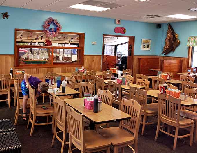 Light wood tables and turquoise walls create a beachy vibe that says "relax, you're on pancake time now."
