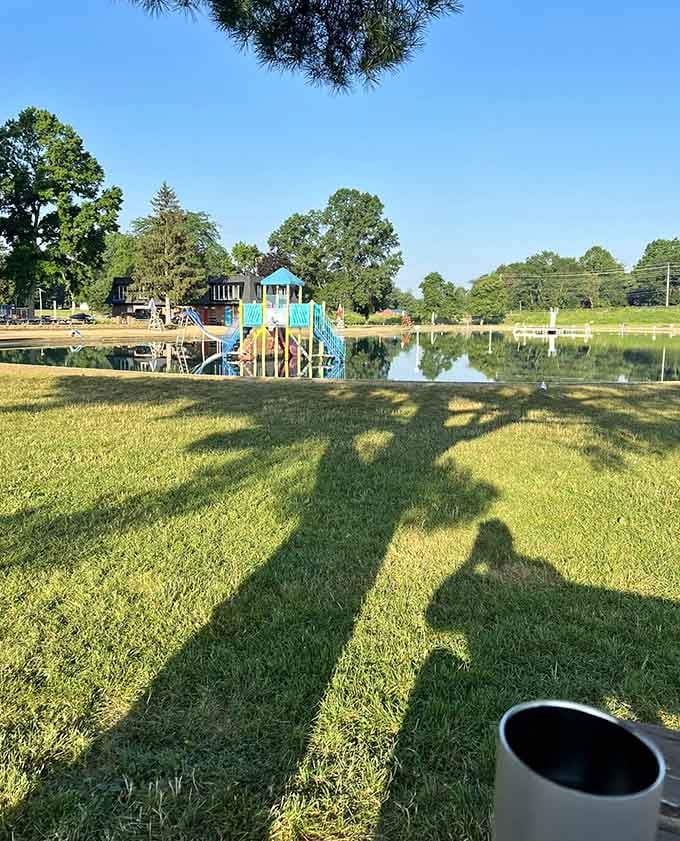 Morning shadows stretch across perfectly manicured lawns, promising another beautiful day at this hidden treasure.