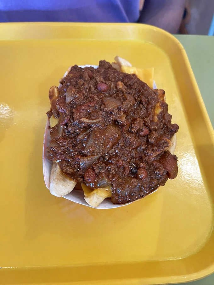 Chili cheese fries that look like they're auditioning for a role in your most satisfying food dreams tonight.