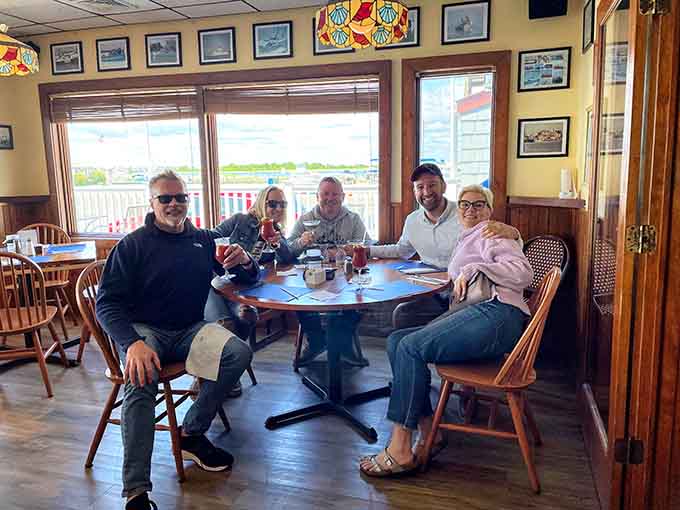 Generations gather around these tables, creating new memories while honoring old traditions in a place that welcomes everyone like family coming home.