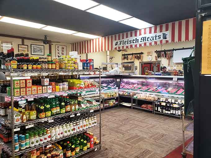 The deli counter where imported German goods and house-made sausages live together in perfect, delicious harmony under striped awnings.